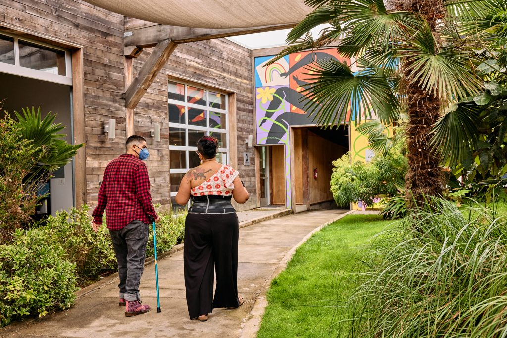 A masked courtyard stroll - Disabled And Here - SHINE SA